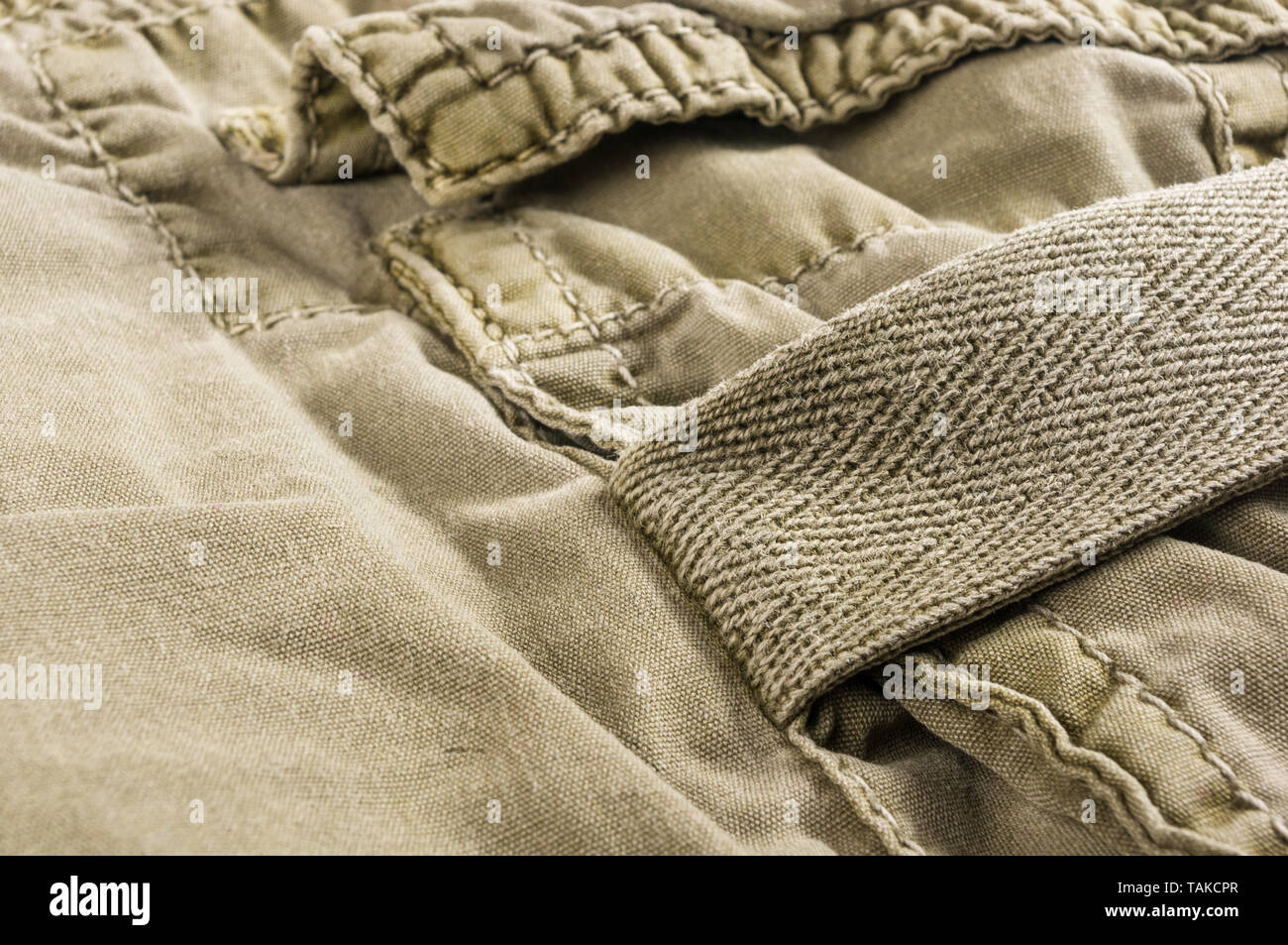 clothing items washed cotton fabric texture with seams, macro, close-up ...