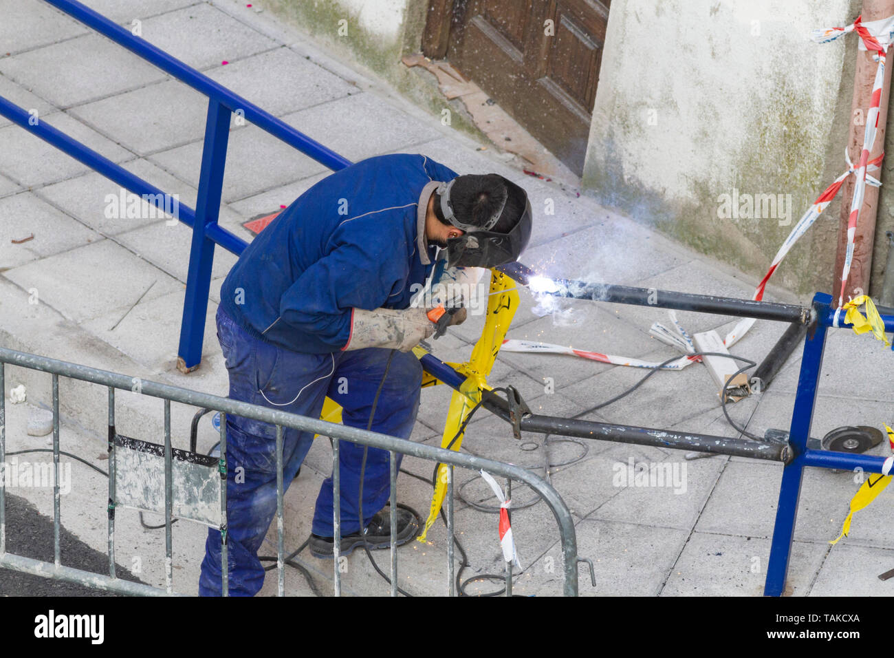 worker welding a handrail Stock Photo - Alamy
