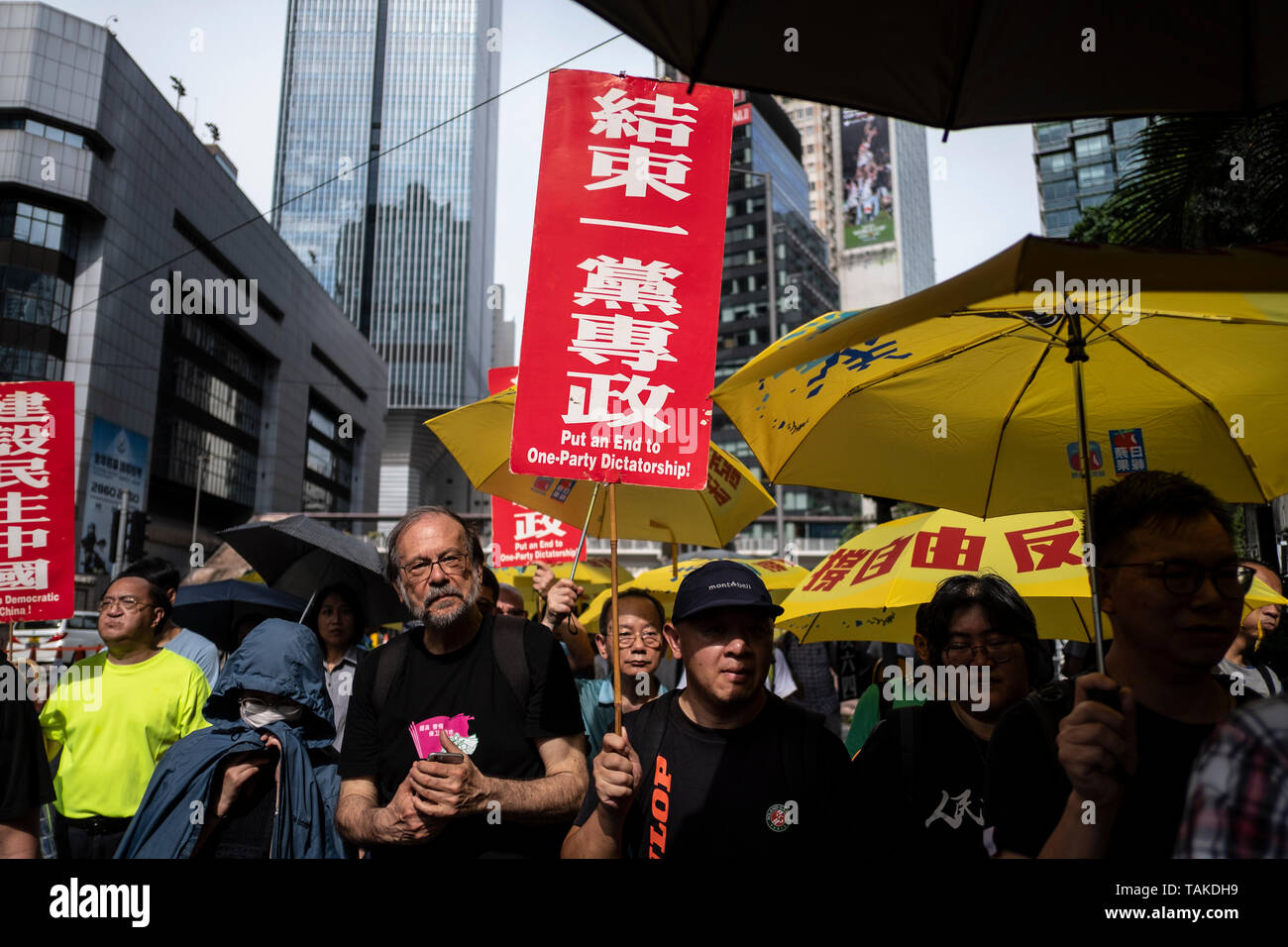 A protester seen holding a paper placard during the demonstration. Pro ...