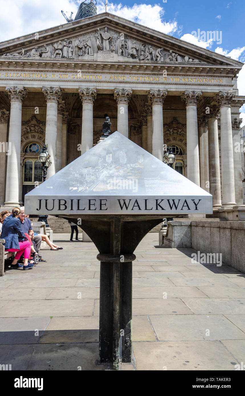 The Royal Exchange Building in London, UK with an obelisk with ...
