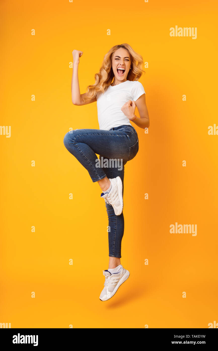 Gorgeous active woman posing smiling hi-res stock photography and ...