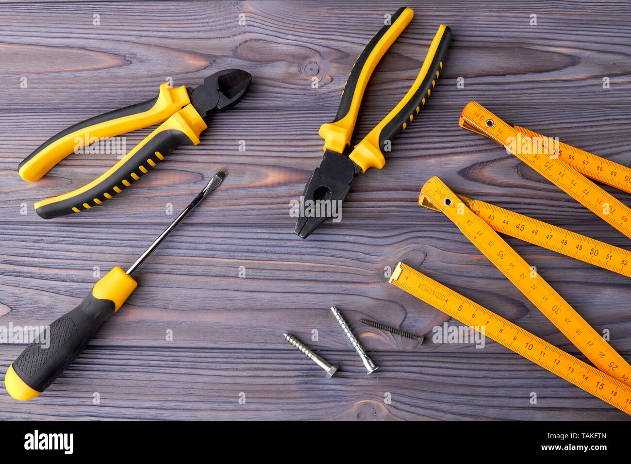 Construction tools on wooden background. Kit of construction tools and ...