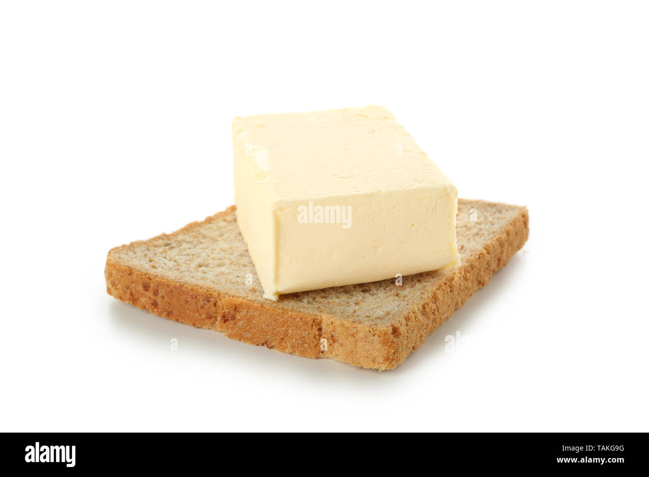 Piece of bread with butter on white background Stock Photo - Alamy