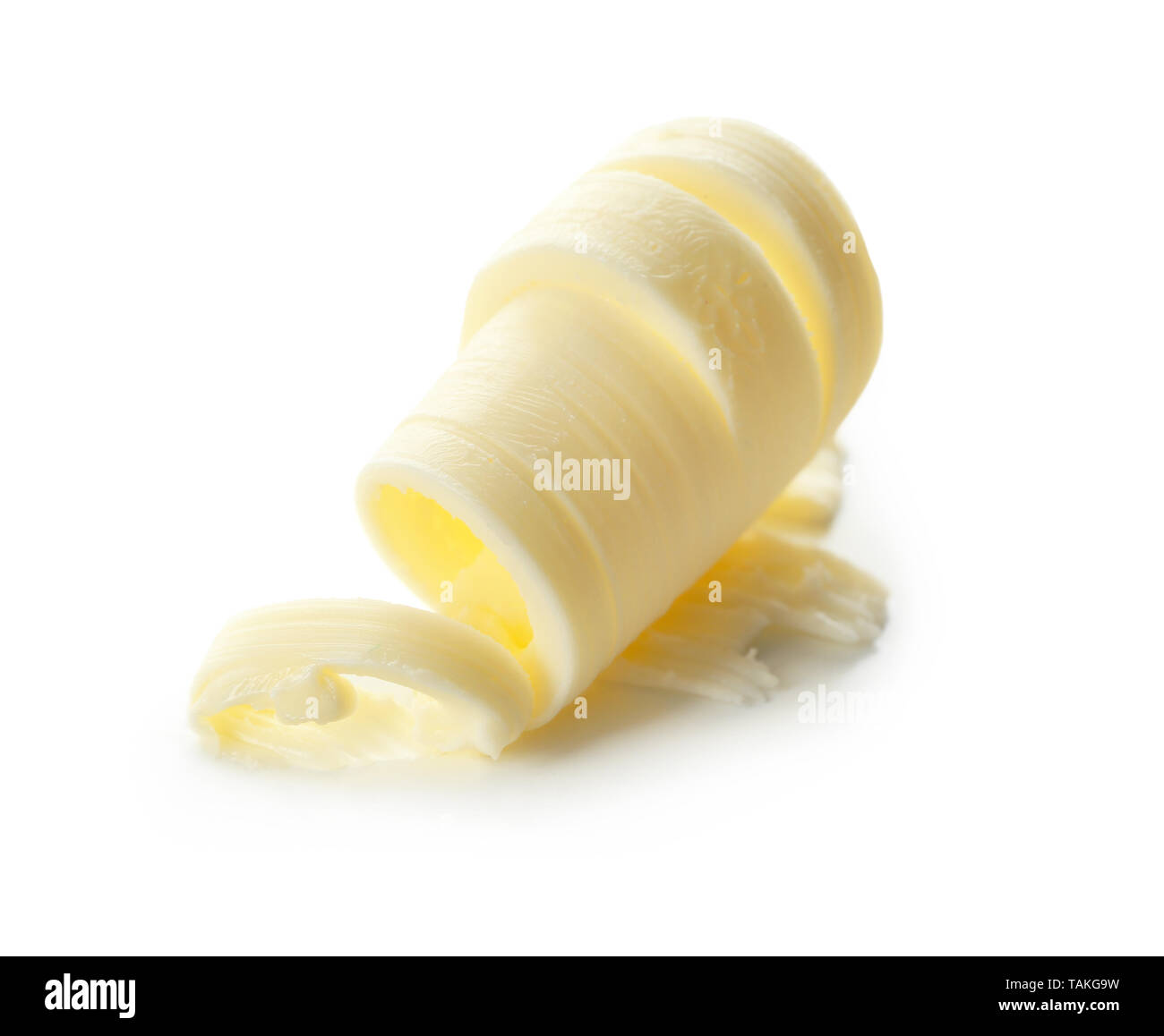 Butter curl on white background Stock Photo - Alamy