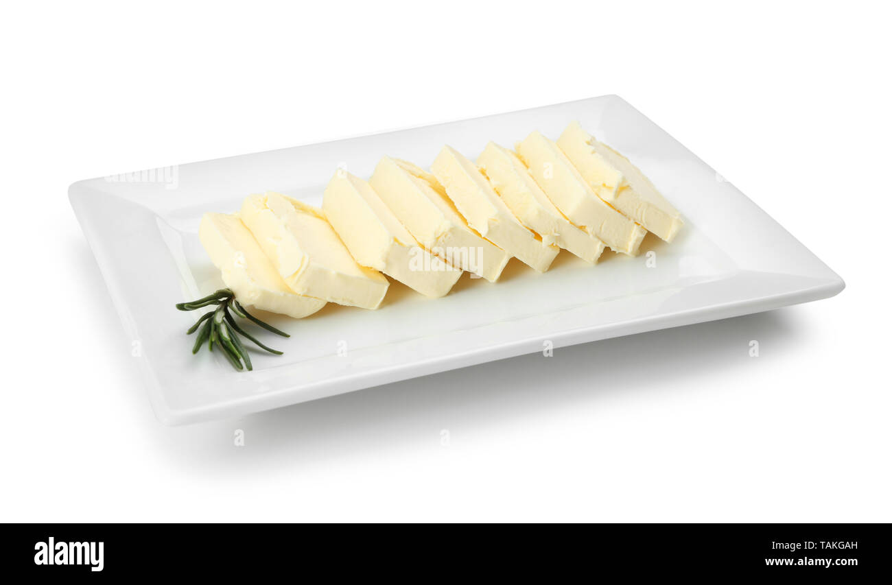 Plate with butter on white background Stock Photo - Alamy