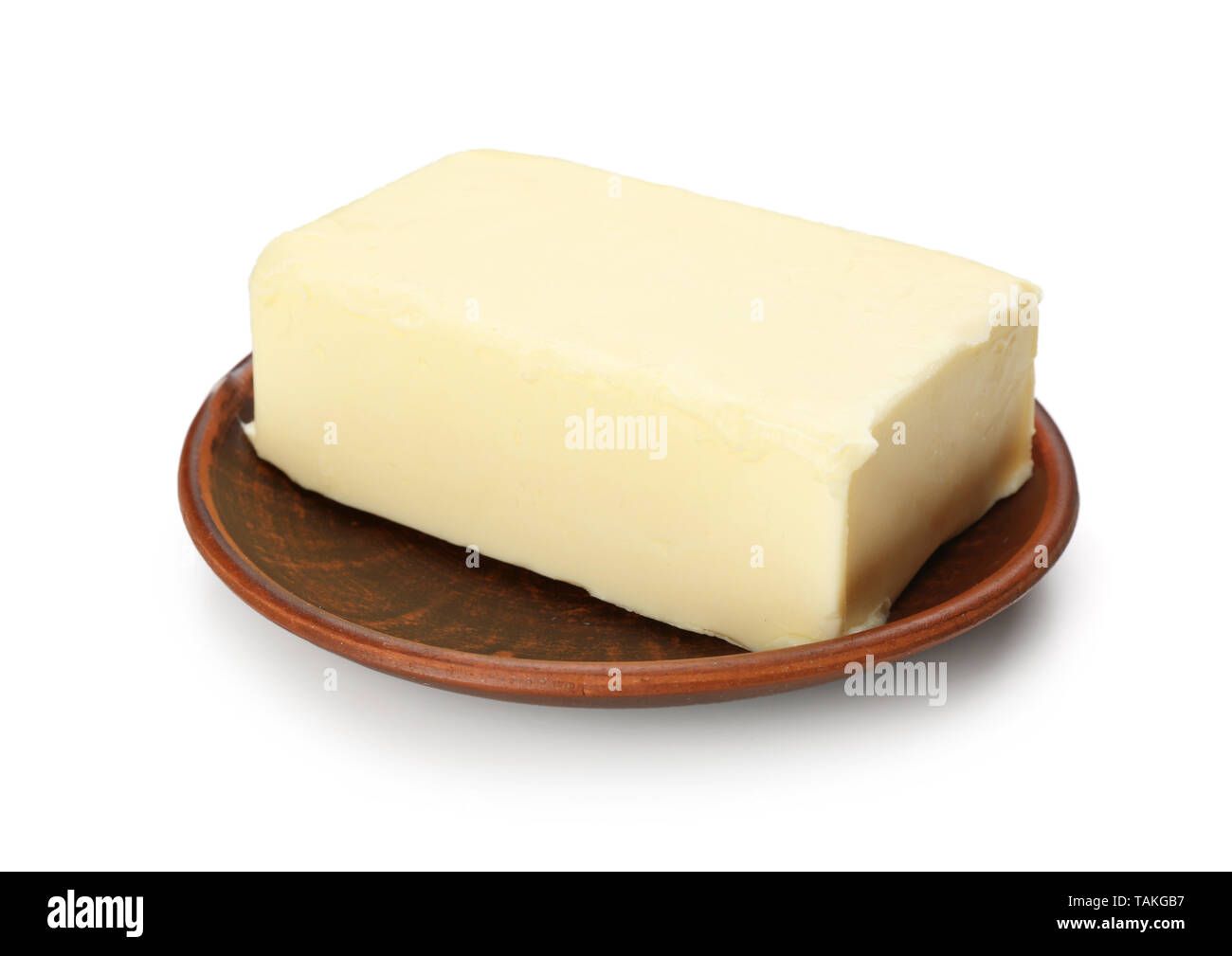 Plate with butter on white background Stock Photo - Alamy
