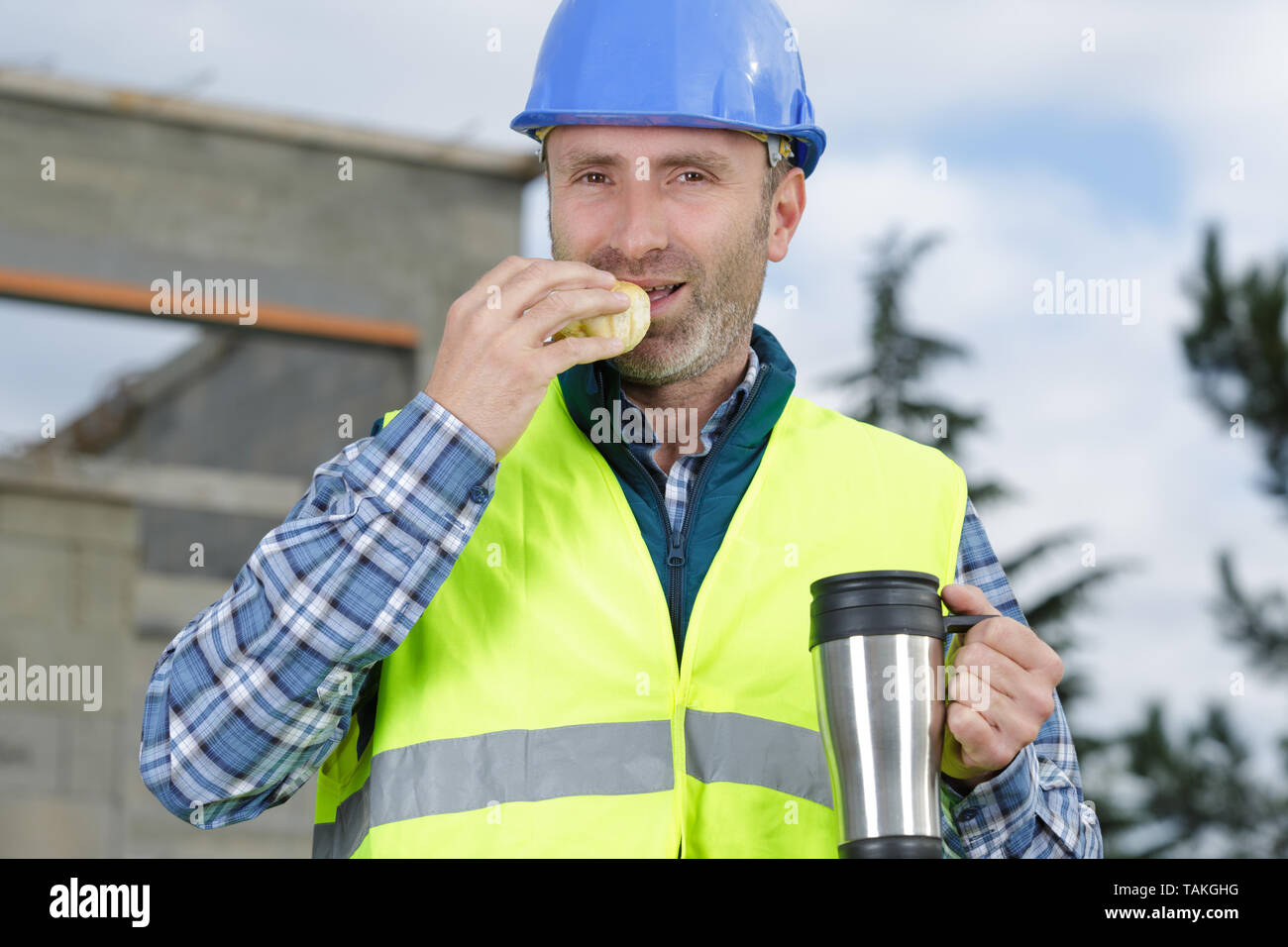 workman taking a coffee break Stock Photo - Alamy