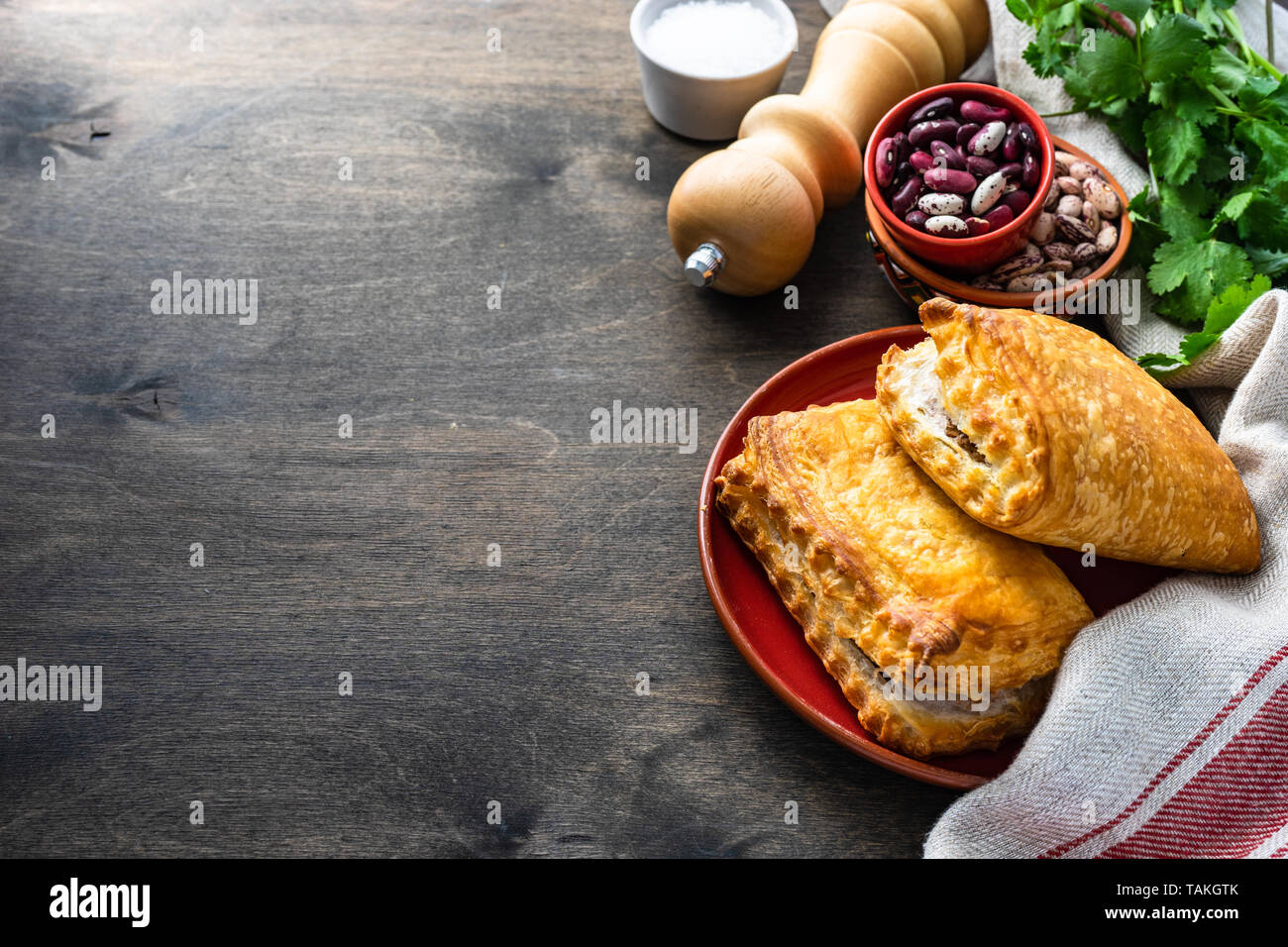 Traditional georgian lobiani pie with beans and herbs on rustic ...