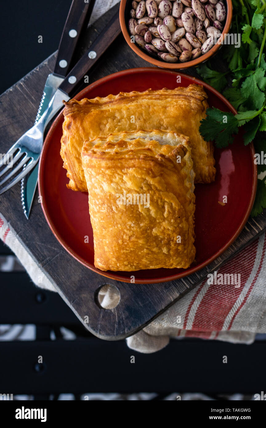 Traditional georgian lobiani pie with beans and herbs on rustic ...