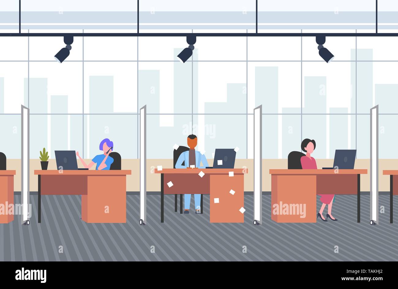 coworkers in creative office operators sitting at workplace desks with ...