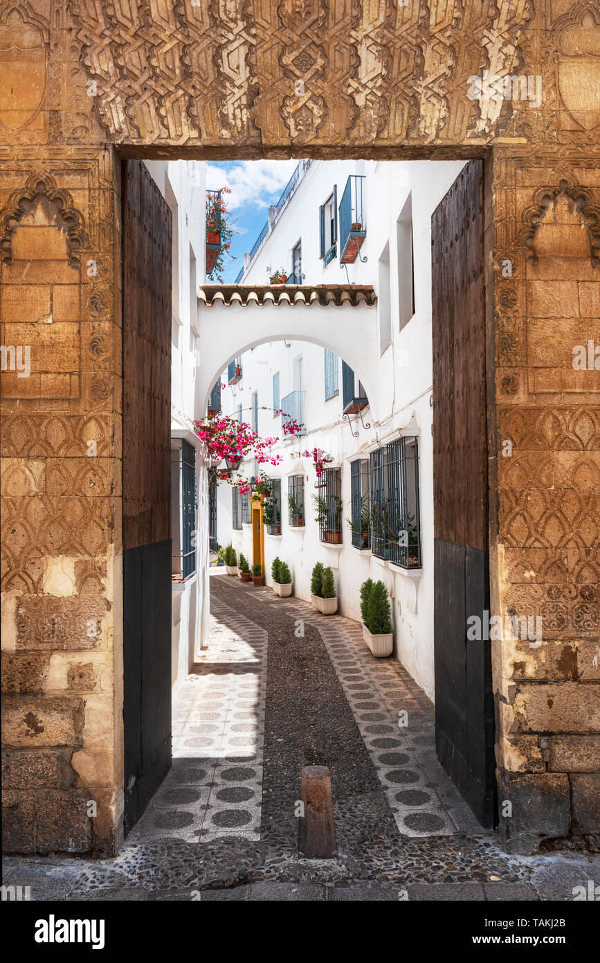 Ancient gate and street in Cordoba, Spain Stock Photo - Alamy