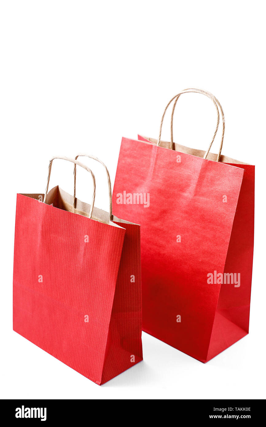 environmentally friendly cardboard red bags on white isolated ...