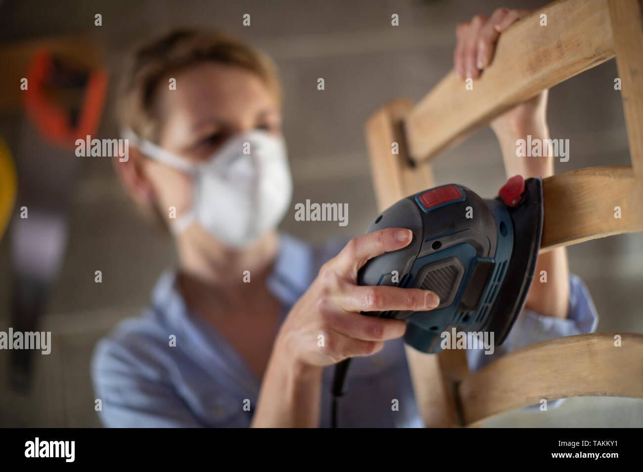 Female electric sander hi-res stock photography and images - Alamy