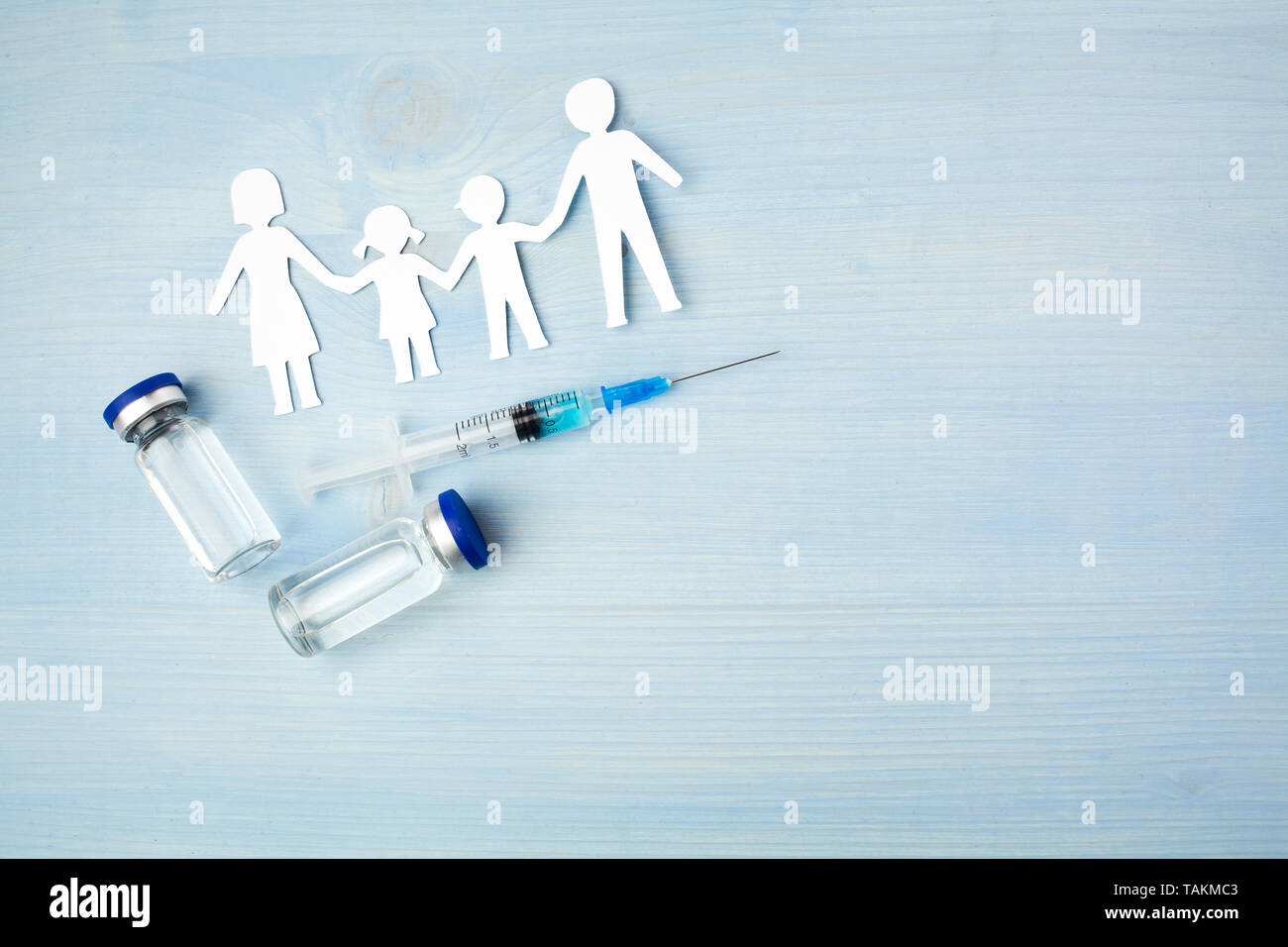 Family immunization concept. Flu vaccine for children. Blue background ...