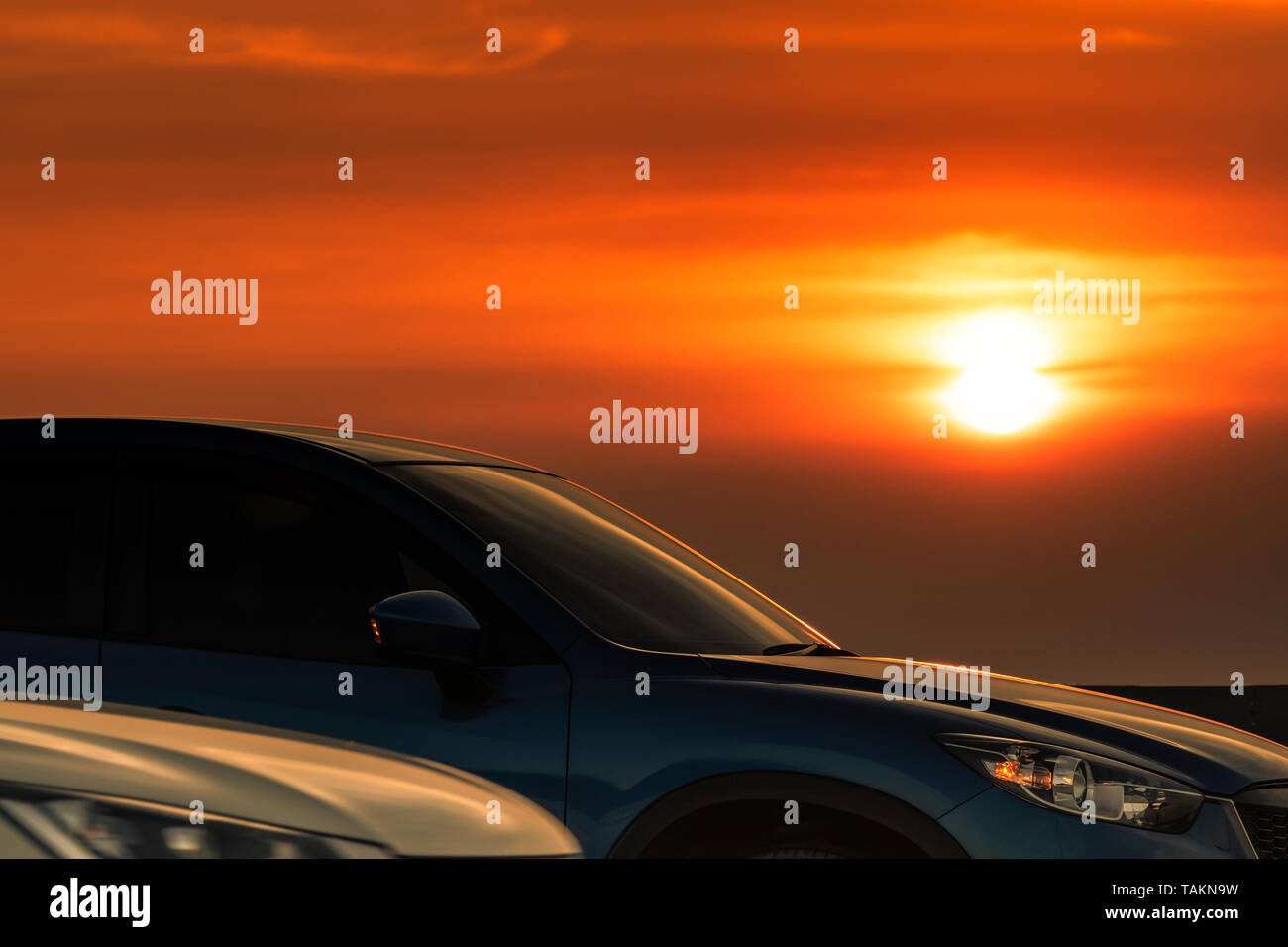 Side view of blue SUV car with sport and modern design parked on ...