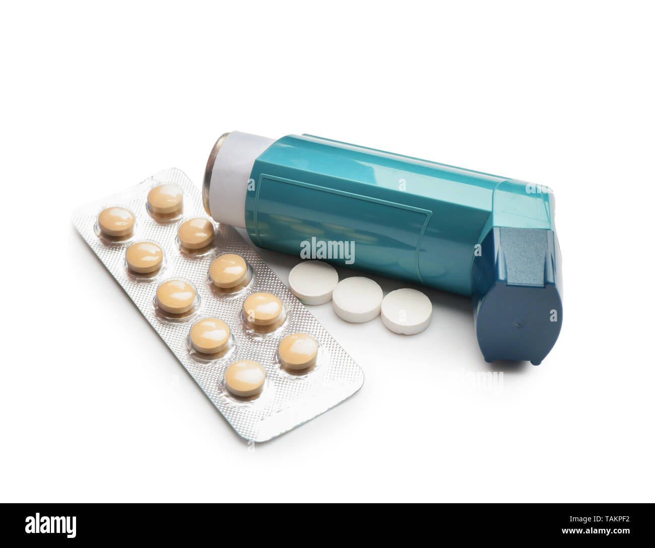 Inhaler and pills on white background Stock Photo - Alamy
