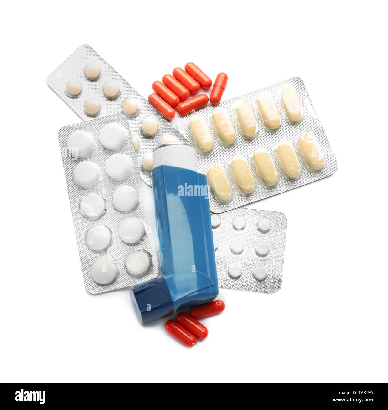 Inhaler and pills on white background Stock Photo - Alamy