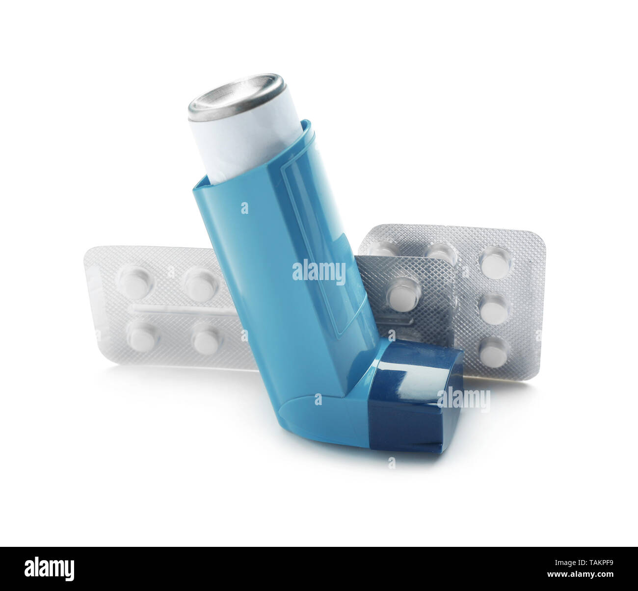 Inhaler and pills on white background Stock Photo - Alamy