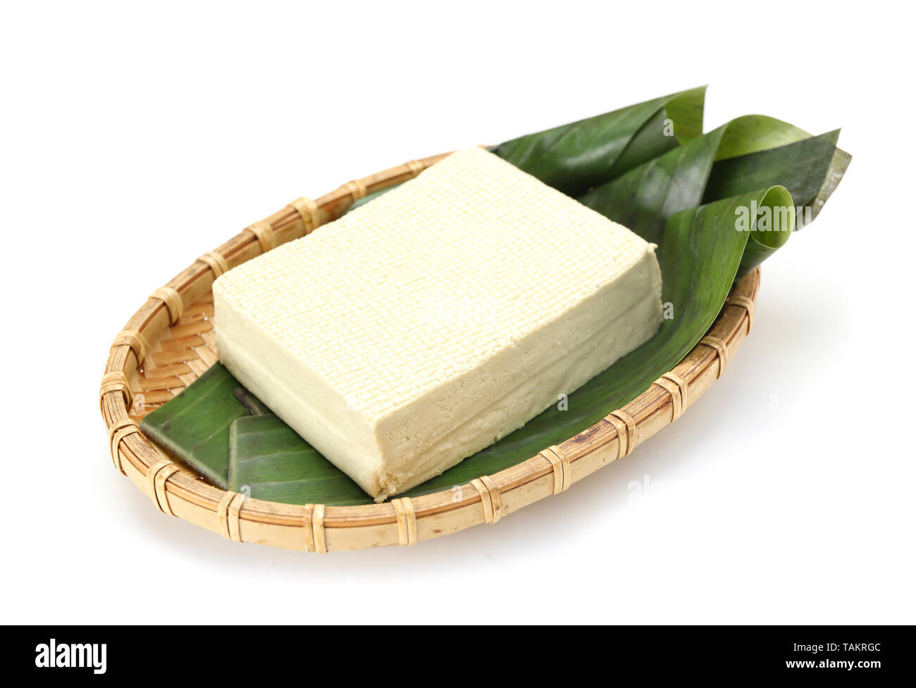 Tasty tofu cheese on white background Stock Photo - Alamy