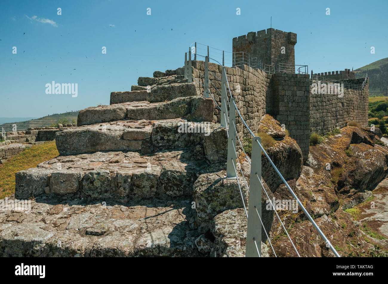 Path with steps over stone wall with balustrade at the Linhares da ...