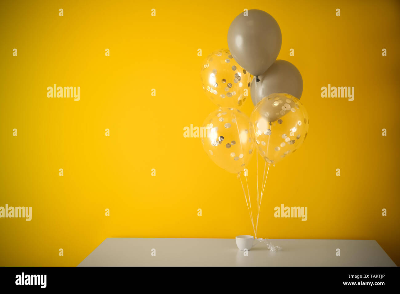 Helium balloons table hi-res stock photography and images - Alamy
