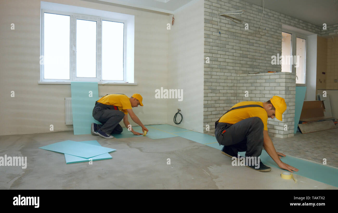 Professional builders working on hi-res stock photography and images ...