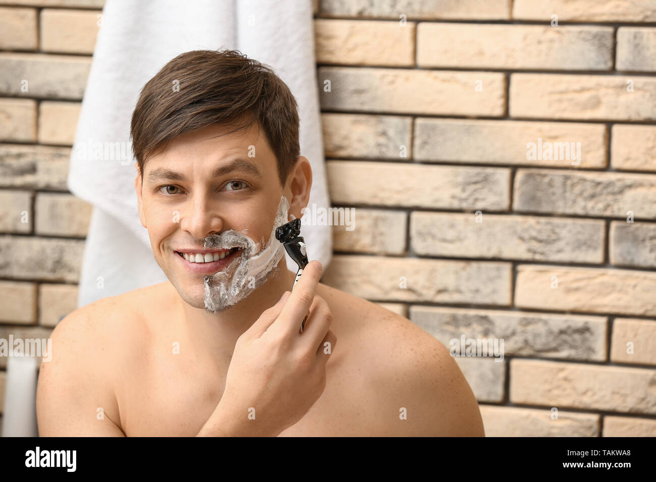 Shaving in bathroom hi-res stock photography and images - Alamy