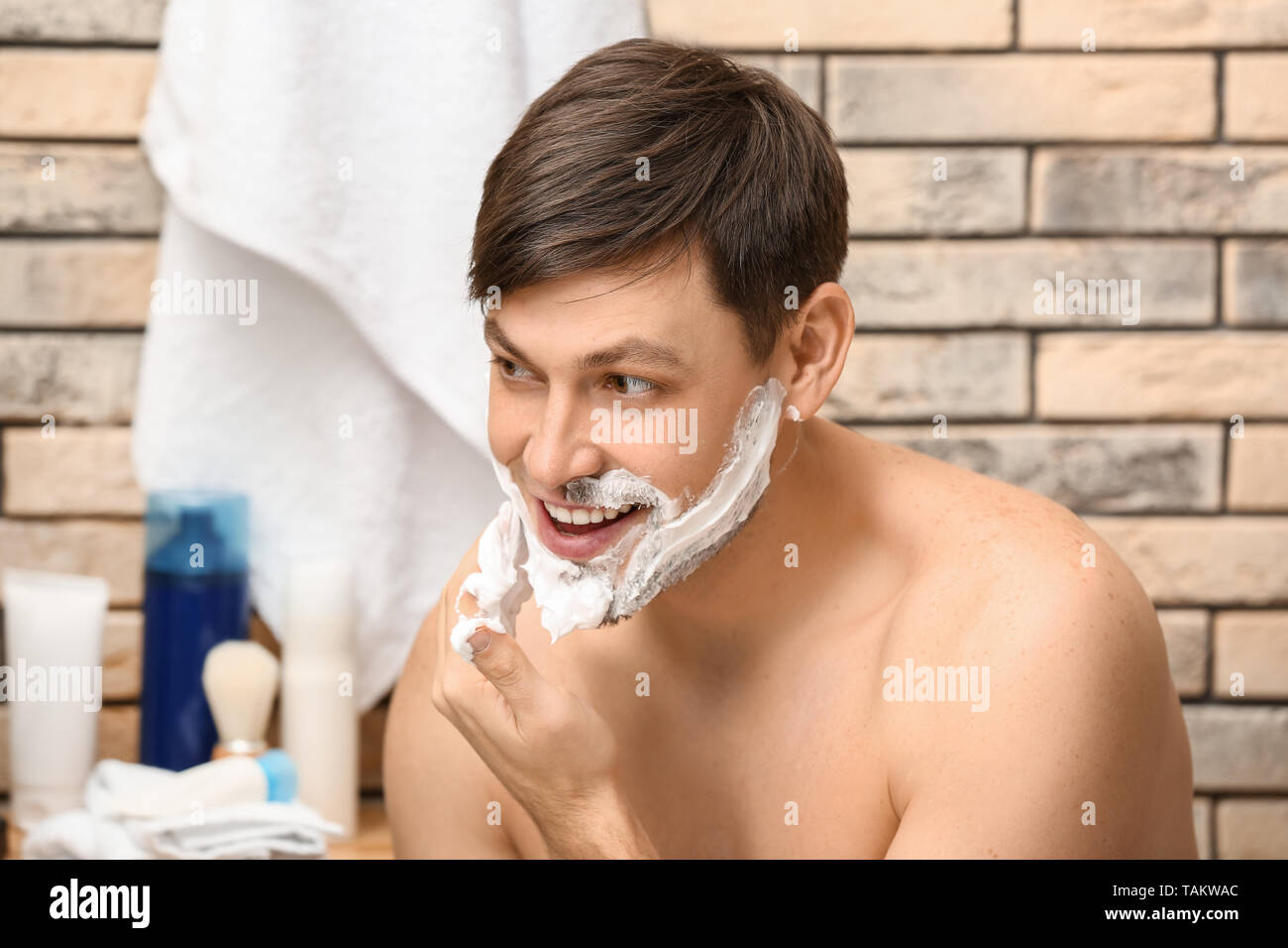 Shaving in bathroom hi-res stock photography and images - Alamy