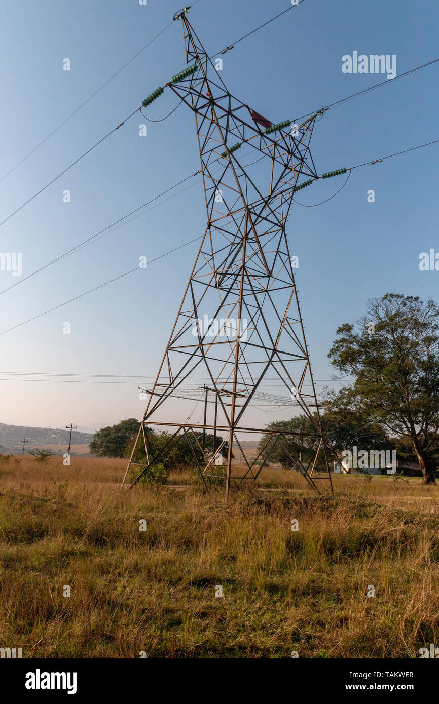 A close up side view of a power line structure Stock Photo - Alamy