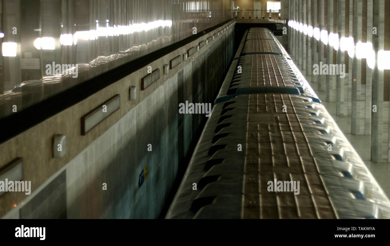 Metro train moving in tunnel, top view. Underground train arriving at ...