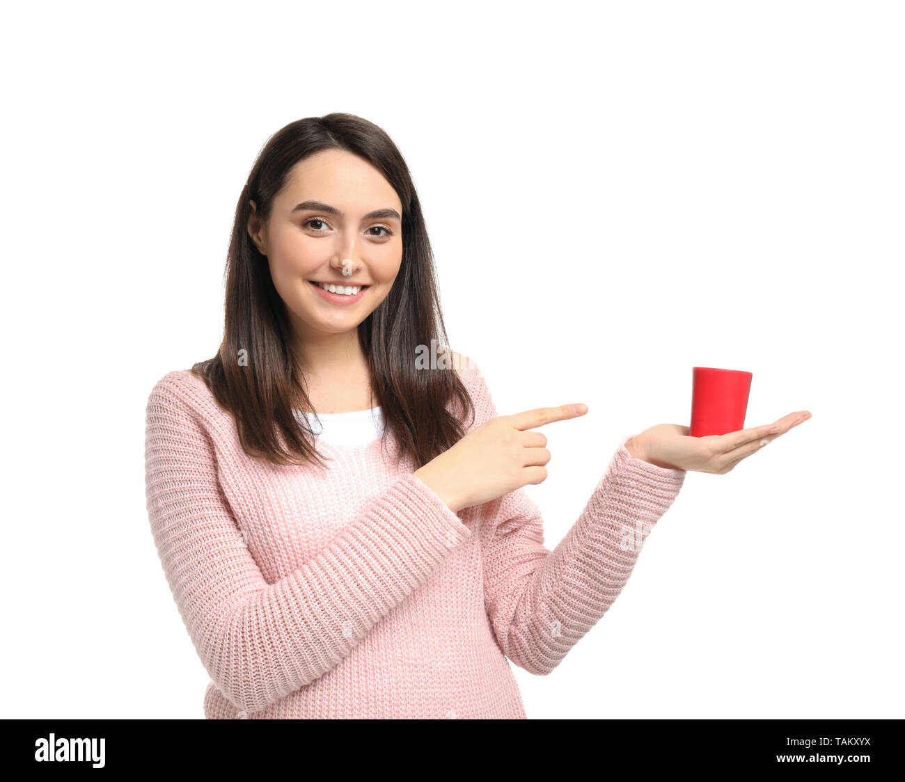 Young woman with smart home assistant device on white background Stock ...