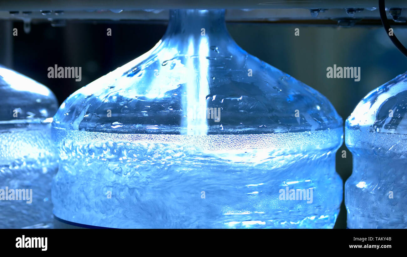 Container being filled with water. Gallons of clean water. Gallon water ...