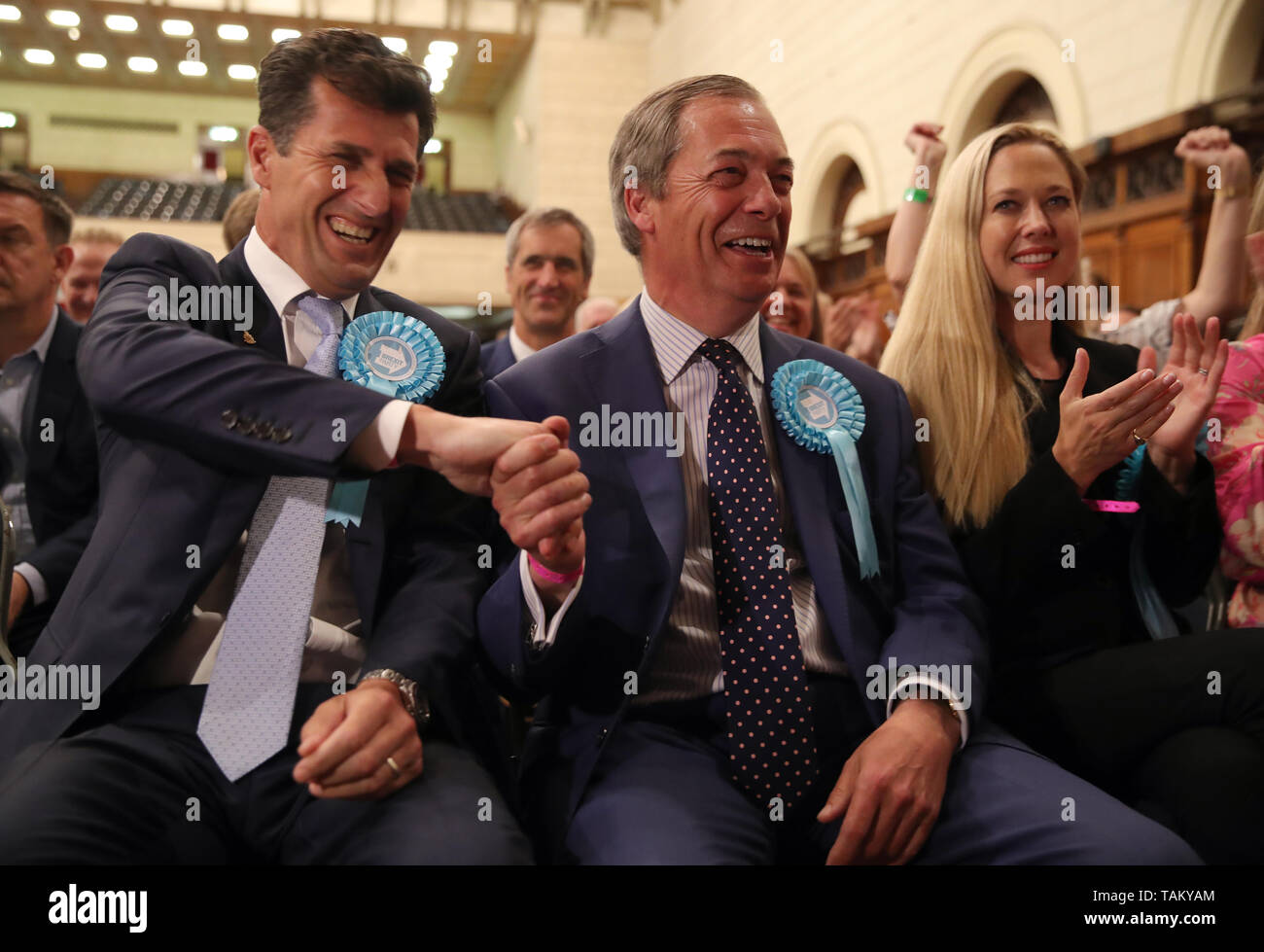 Brexit Party leader Nigel Farage (centre) celebrates being elected ...