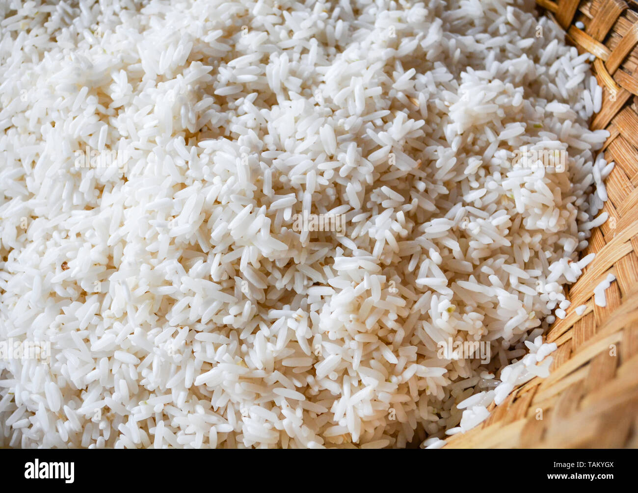 Raw sticky rice white in steamer bamboo for cook steamed food Stock ...