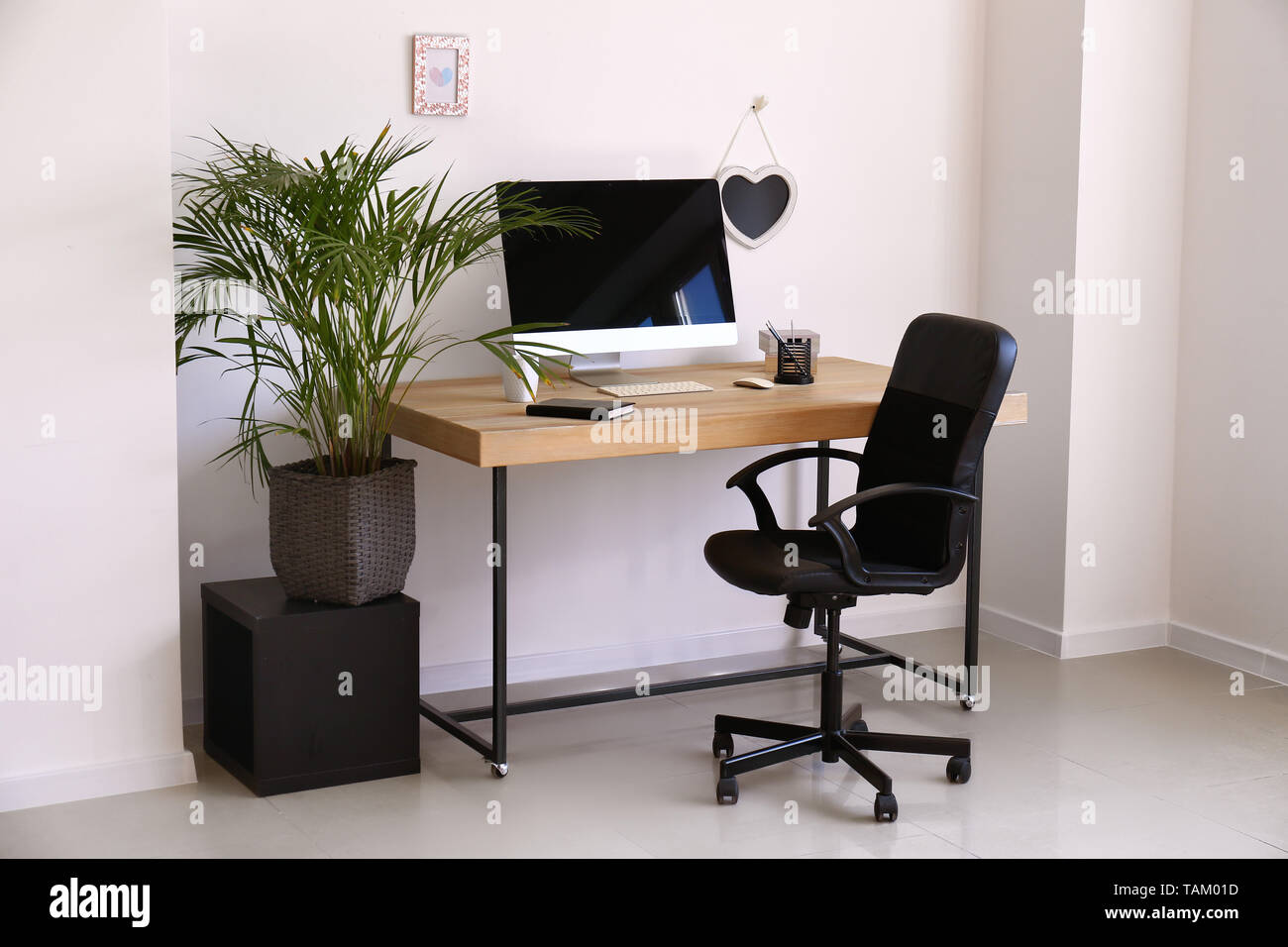 Stylish workplace with modern computer in interior of room Stock Photo ...