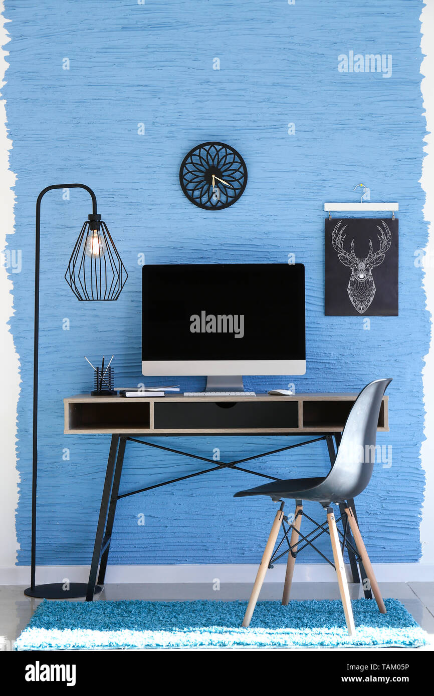 Stylish workplace with modern computer in interior of room Stock Photo ...