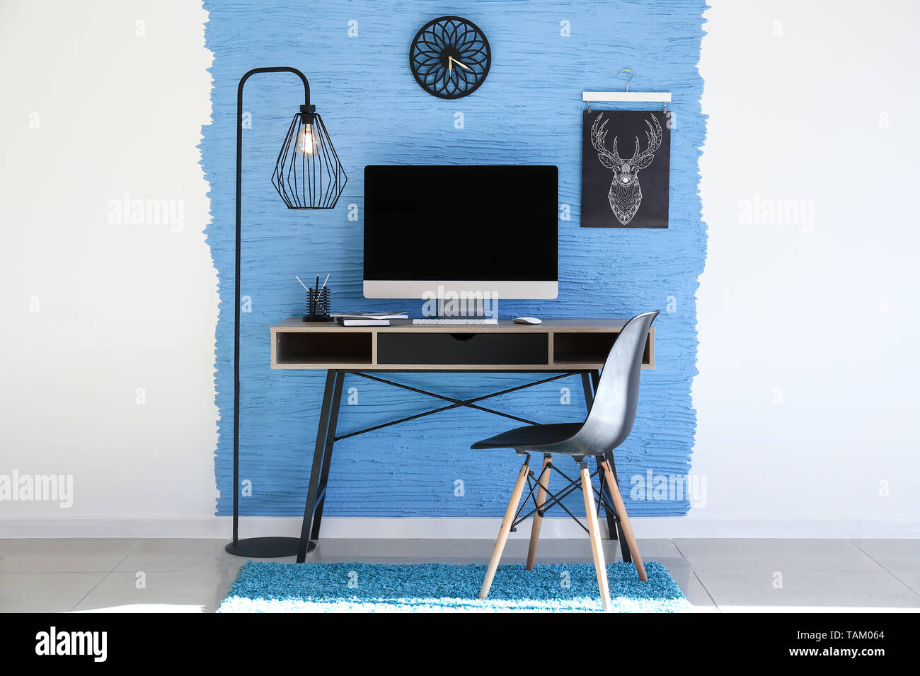 Stylish workplace with modern computer in interior of room Stock Photo ...