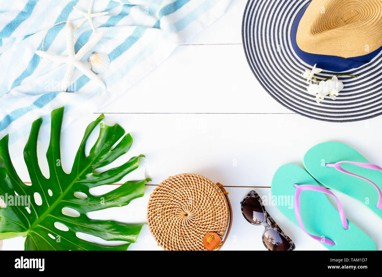 Summer flat lay top view frame on white wooden planks background with ...