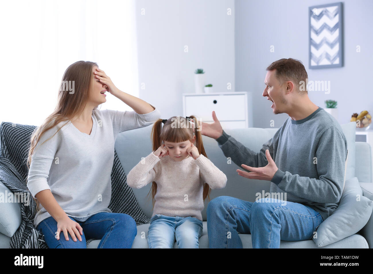 Kid plugging ears hi-res stock photography and images - Alamy