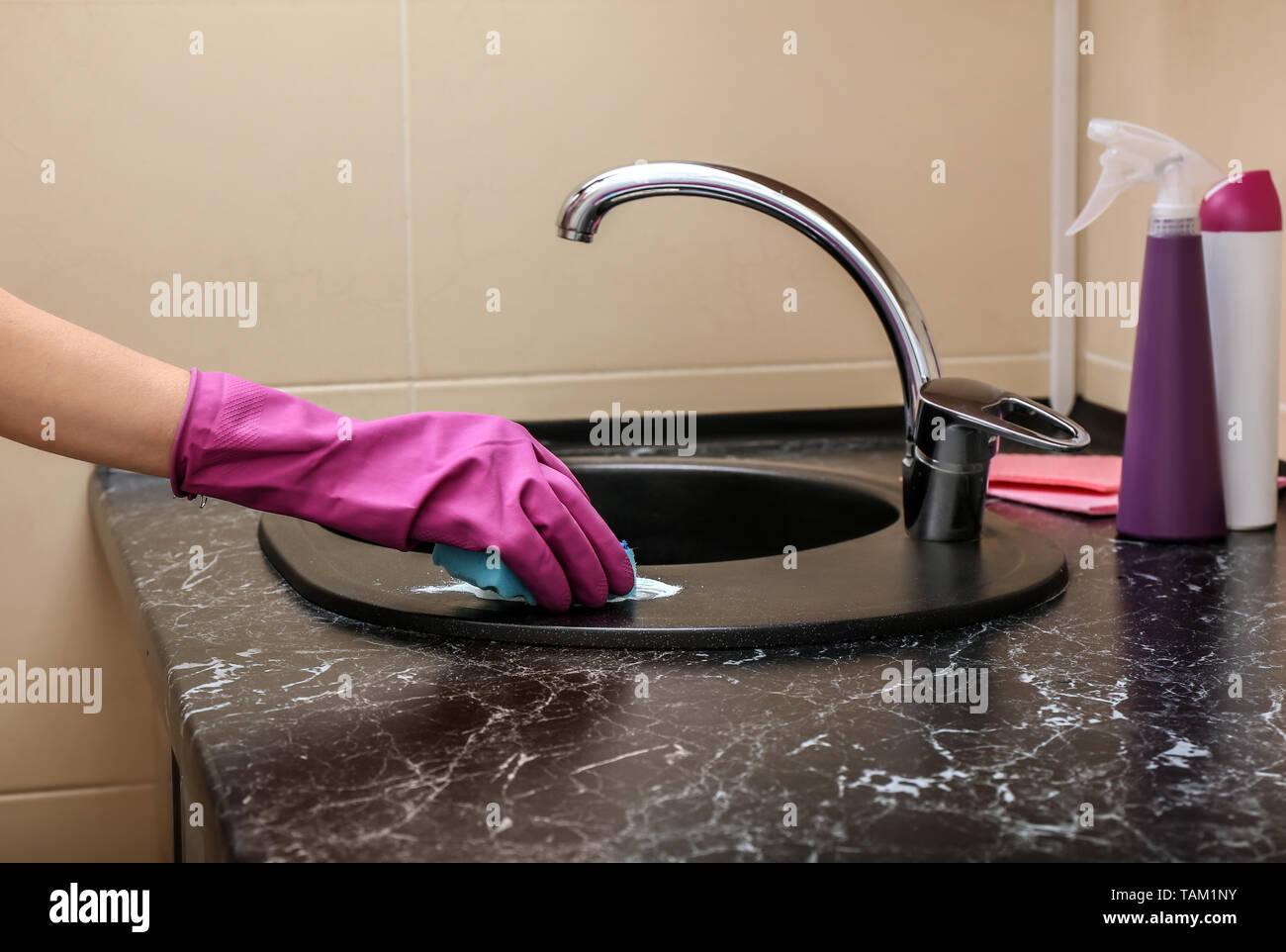 Wiping bathroom sink hi-res stock photography and images - Alamy