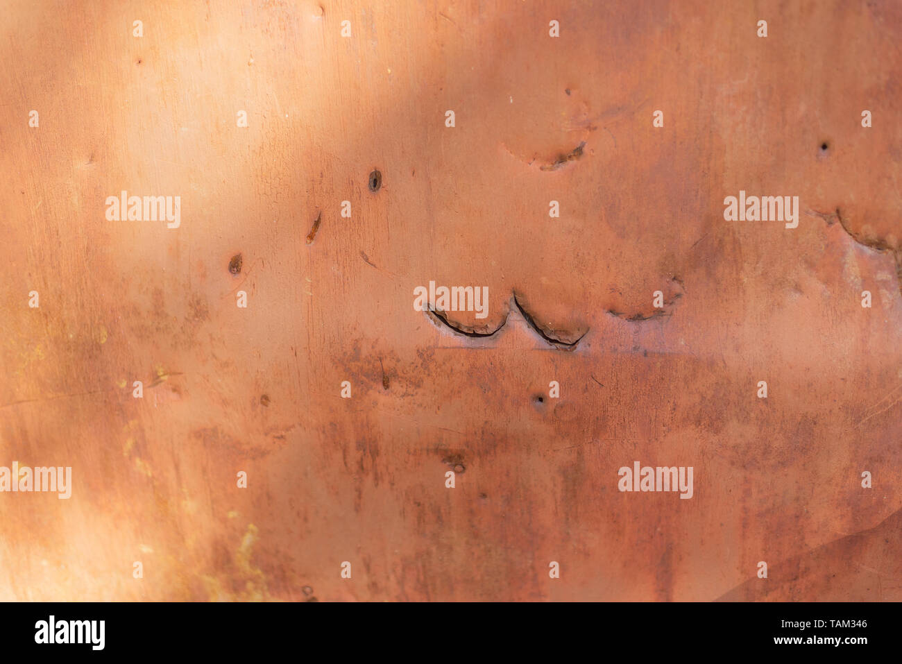 metal rusty background with dents and holes. Orange metal texture Stock ...