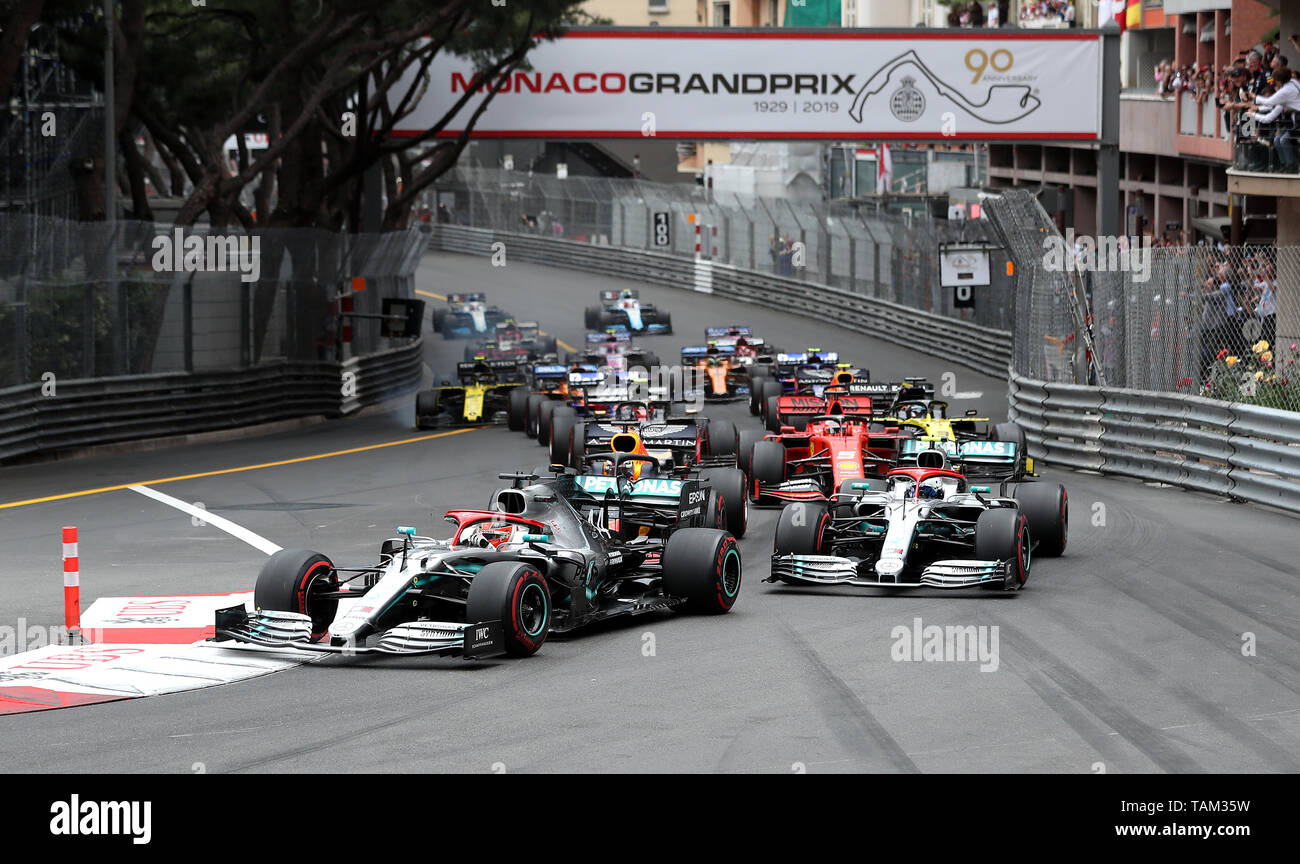 Mercedes' Lewis Hamilton leads into the first corner during the 2019 ...