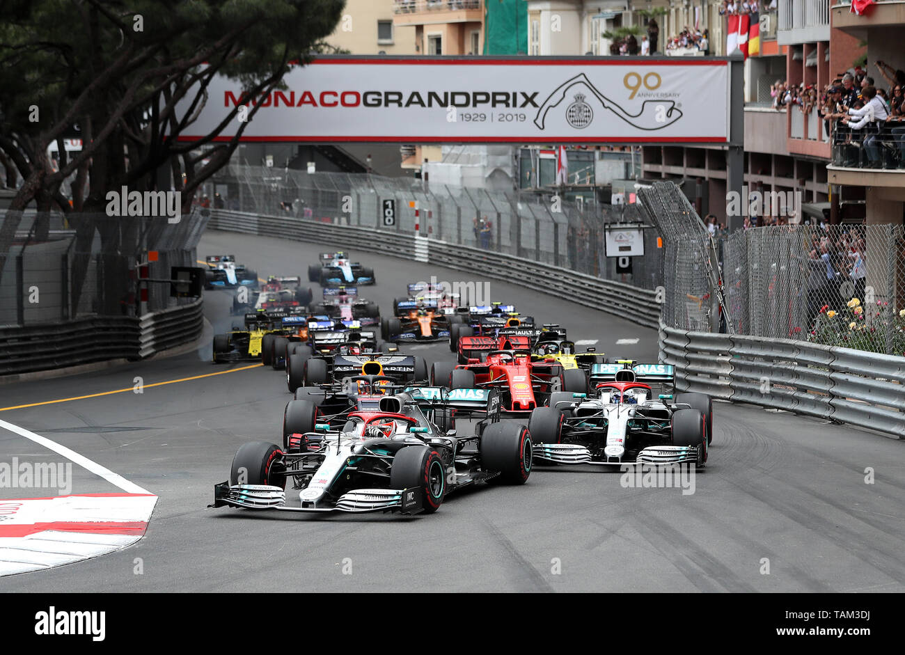 Mercedes' Lewis Hamilton leads into the first corner during the 2019 ...