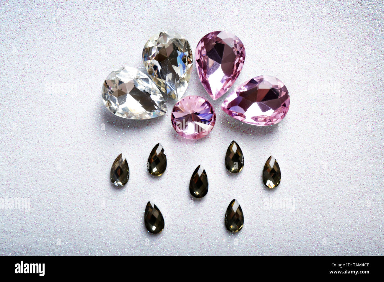 Composition with precious stones for jewellery on white background ...