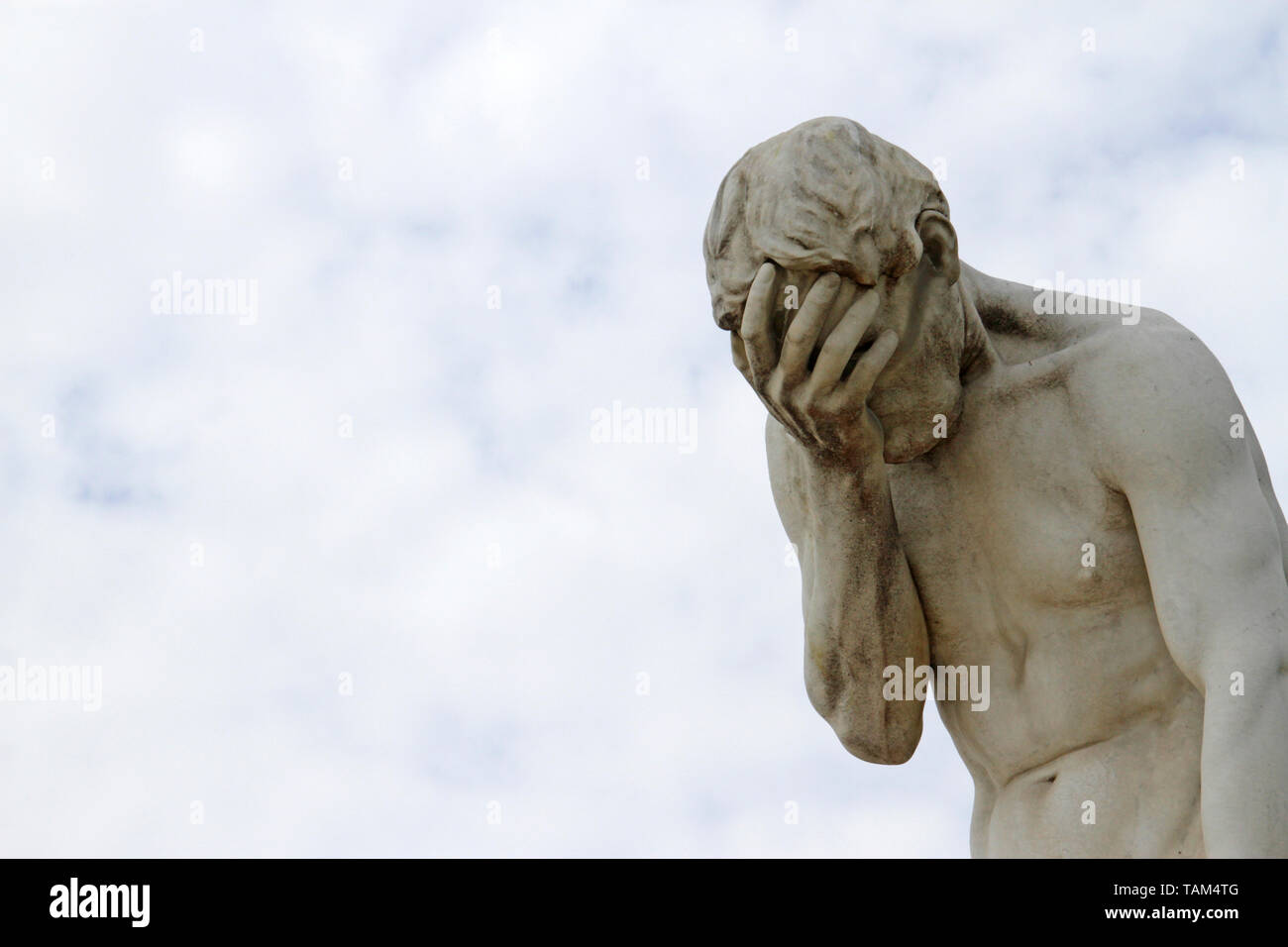 Facepalm - ashamed, sad, depressed. Statue with head in hand Stock ...