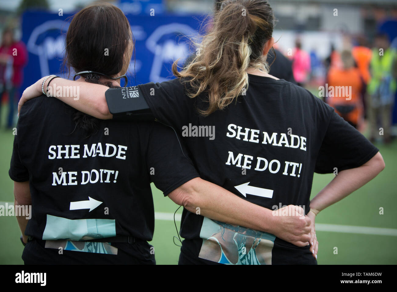 Runners, at the finish line of the Edinburgh Marathon Festival, in ...