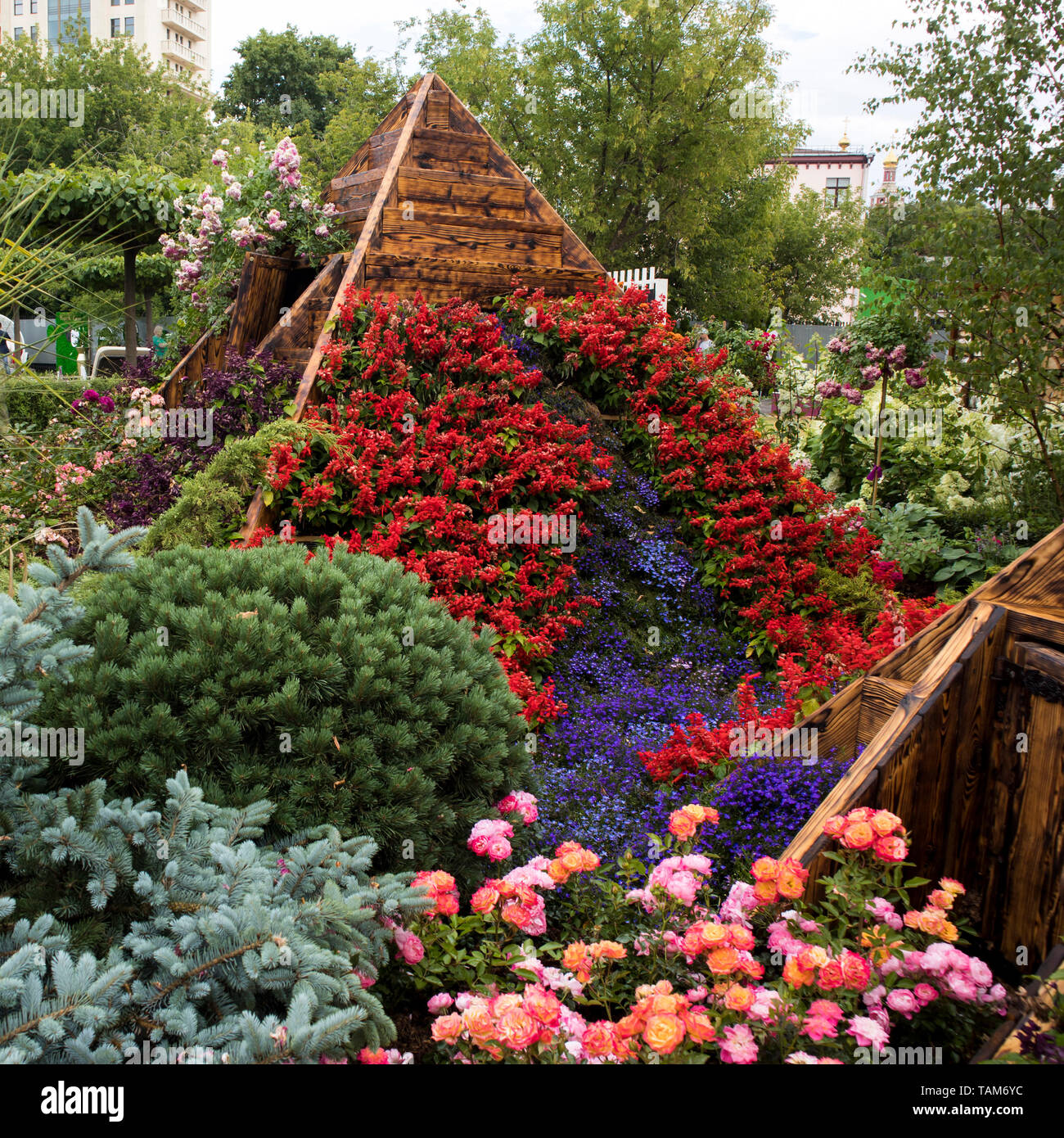 Pyramid as a flower bed with different colors. Landscape Design Stock ...