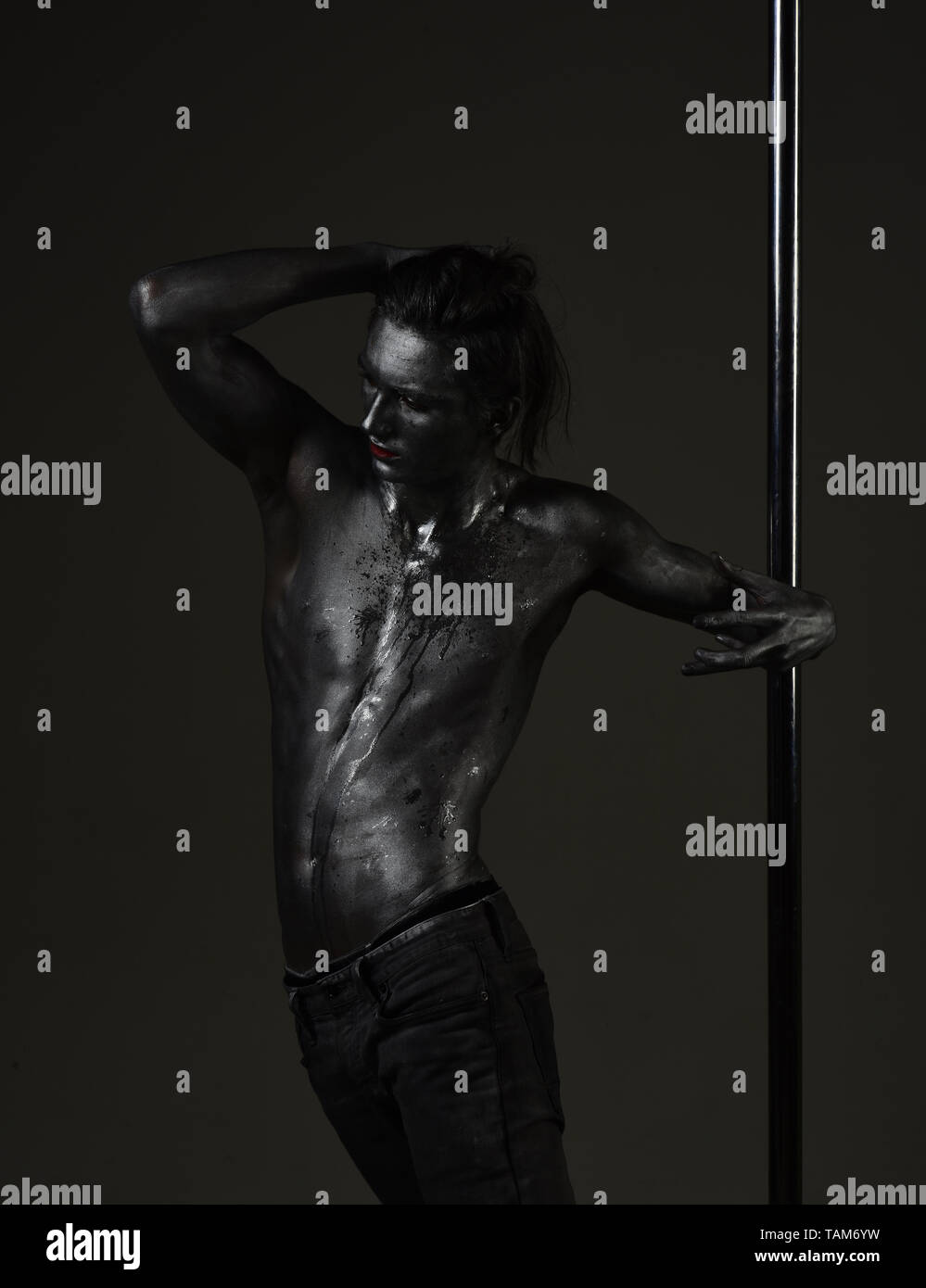 drama mood. drama in life of tired sad man with metallic body at pylon ...