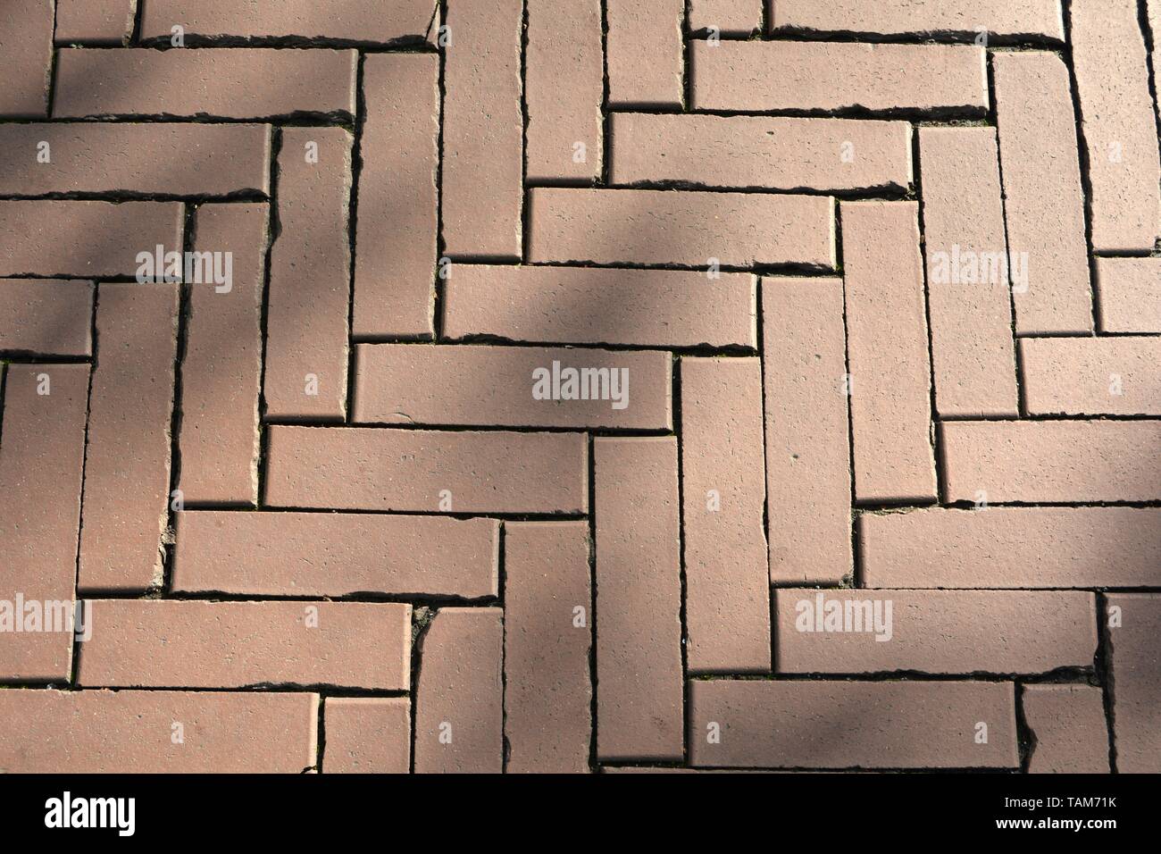 Red concrete paving bricks hi-res stock photography and images - Alamy