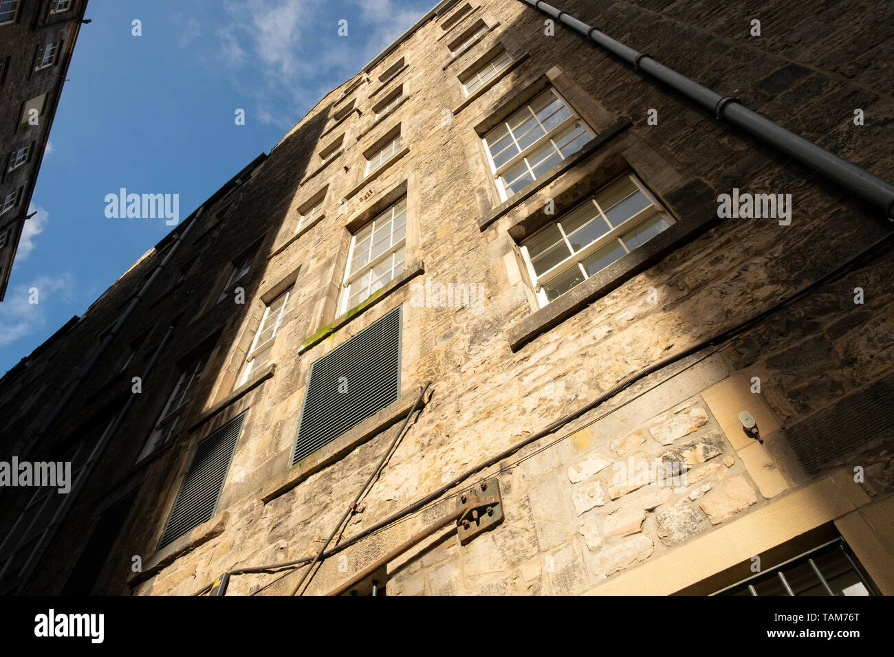 Detail of old 8 storey tenement building in St Ninian's Row, central ...